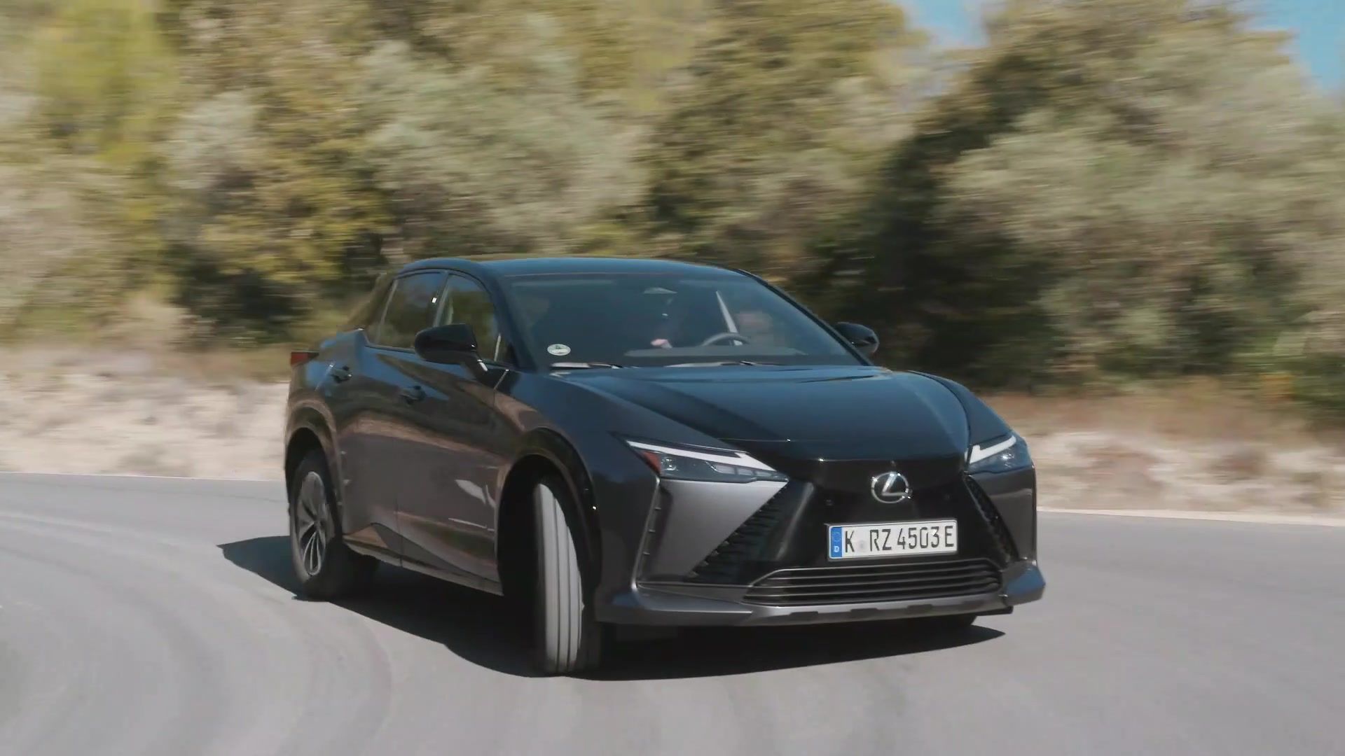 The new Lexus RZ 450e in Sonic Chrome bi-tone Driving Video